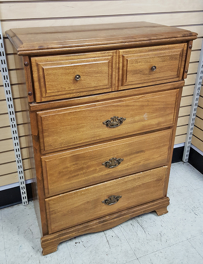 This solid wood dresser has weathered changing design trends and stands ready to hold your sweater collection with old-school craftsmanship.