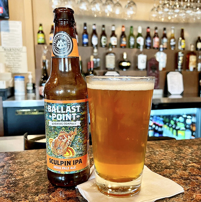 A properly poured Ballast Point Sculpin IPA&mdash;because great food deserves equally great beer. California craft brewing at its refreshing best.