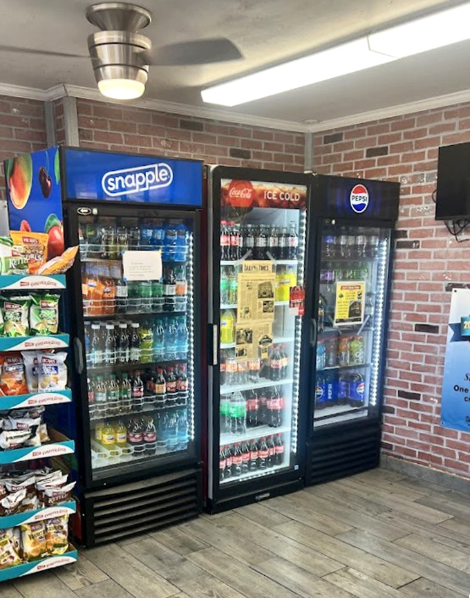 The drink coolers—where decisions get made while you're waiting for your order. Will it be Snapple, Coke, or Pepsi to wash down that masterpiece?