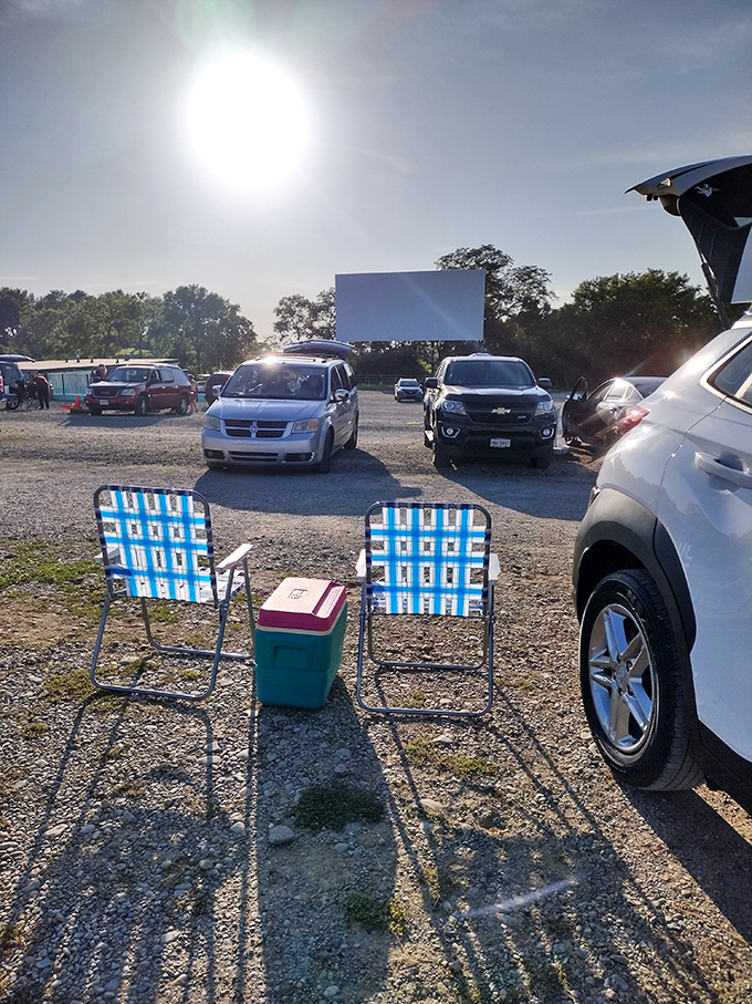 The quintessential drive-in setup: lawn chairs, cooler, and prime parking spot&mdash;veteran movie-goers know the secret to comfort.