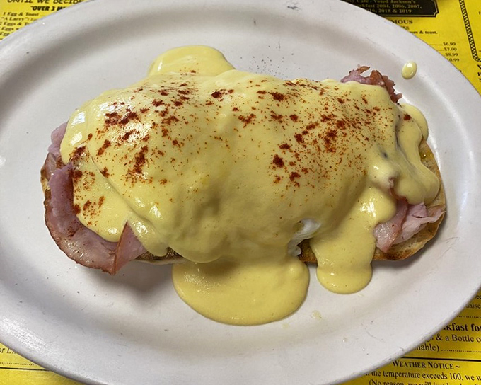 Eggs Benedict with hollandaise so rich it should have its own tax bracket. The sprinkle of paprika adds both color and a hint of spice.