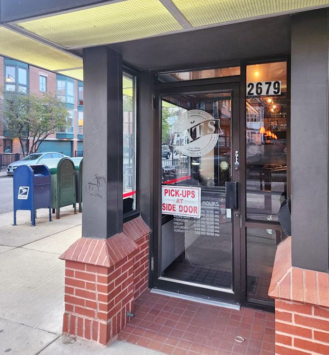 The entrance at 2679 N. Lincoln announces itself without fanfare &ndash; just a straightforward door promising honest food and zero culinary gimmicks inside.
