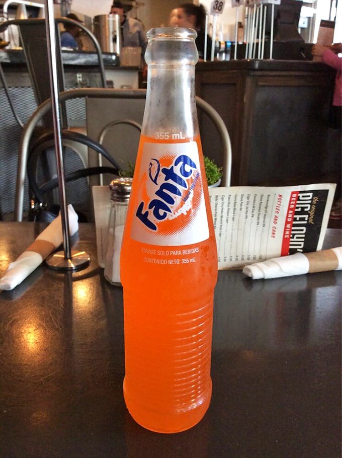 Nothing says "vacation mode" quite like a bright orange Fanta alongside your barbecue&mdash;a nostalgic sip that brings out your inner kid.