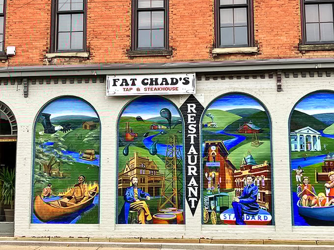 Fat Chad's storefront mural celebrates local history with artwork that makes even parking lots feel like galleries.