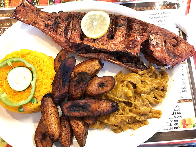 Whole grilled fish with fried plantains and that signature onion sauce&mdash;this is how coastal Senegal does seafood right.