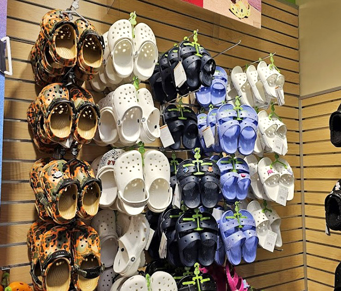 The Crocs rainbow&mdash;comfort's comeback kid displayed in every hue imaginable. Love them or hate them, your feet will thank you after a day of outlet exploration.