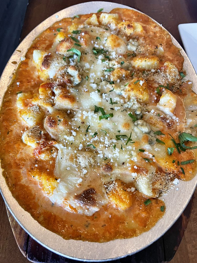 Four cheese gnocchi that's bubbling with more personality than a Scorsese film. Each bite is a pillowy revelation of comfort food perfection.