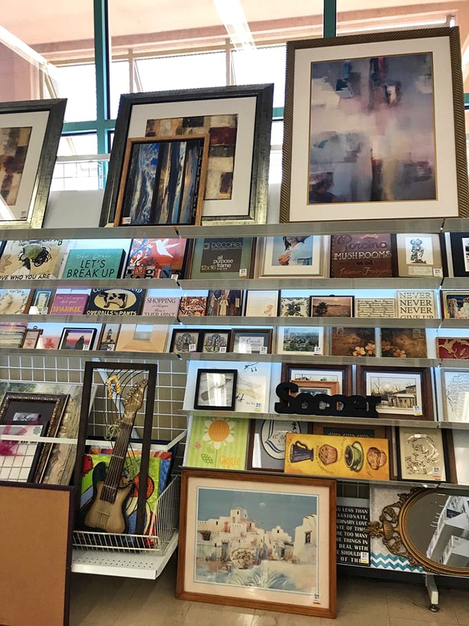 The wall art section: where someone's "it doesn't match our new couch" becomes your "perfect statement piece" for one-tenth the gallery price.