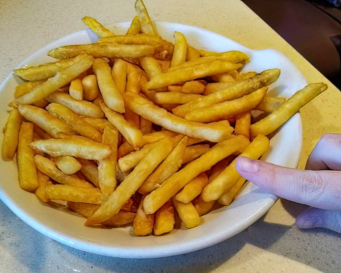 French fries so perfectly golden, they deserve their own trophy—crisp on the outside, fluffy inside, and utterly impossible to stop eating.
