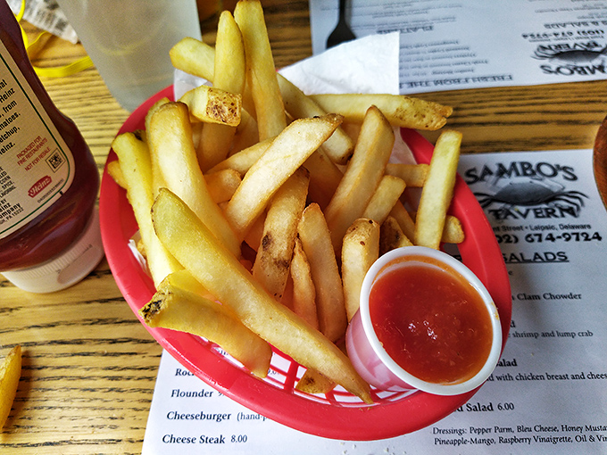 Crispy, golden French fries &ndash; the perfect supporting actors in the seafood drama unfolding on your plate.