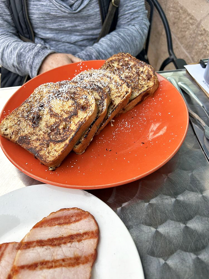 French toast that's achieved the perfect golden-brown exterior while maintaining that custardy interior. The breakfast equivalent of winning the lottery.