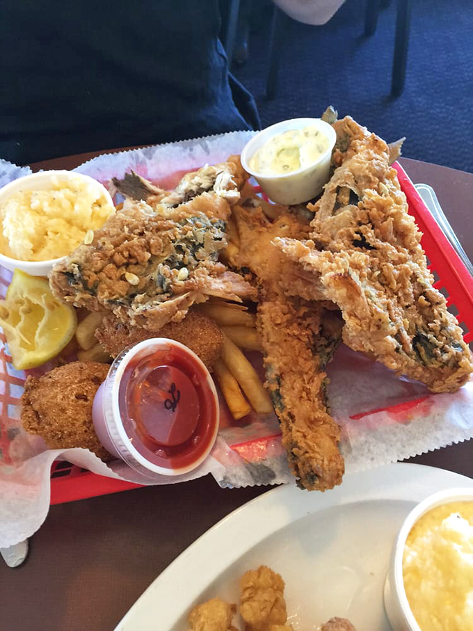 Fried mullet that tastes like the Gulf Coast's greatest hits album &ndash; crispy, flavorful, and paired with sides that know their supporting role perfectly.