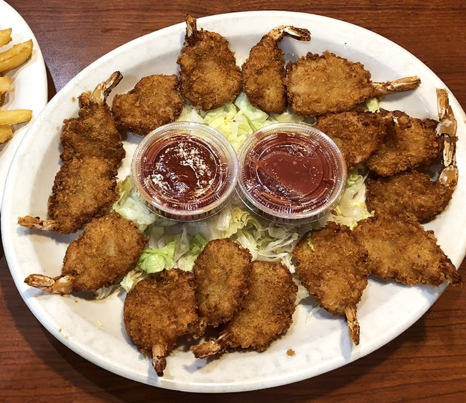Golden-fried shrimp arranged in a circle like a delicious clock telling you it's time to eat. Dipping sauces included.