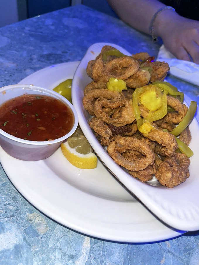 Calamari that's tender inside, crispy outside, with peppers adding just enough kick to make you feel alive. The ocean's tastiest high-five.