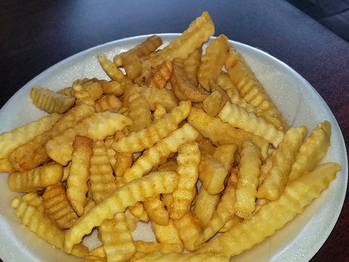 Crinkle-cut fries that remind you why some childhood favorites never need upgrading. Pure potato nostalgia on a plate.