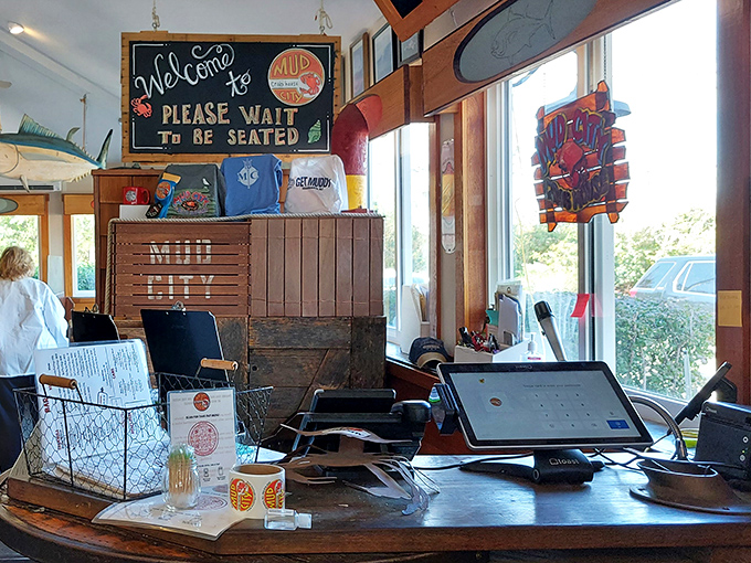 The welcome desk where anticipation begins and seafood dreams come true. Those t-shirts on display will soon become treasured souvenirs of an unforgettable meal.