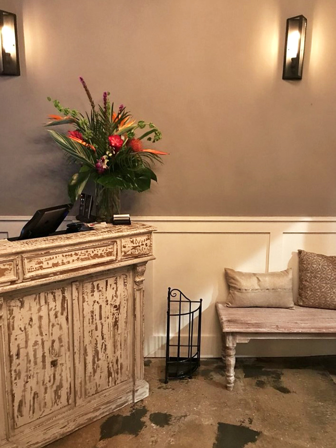 The host station welcomes you with distressed elegance and fresh flowers&mdash;like your stylish friend who makes everything look effortless.