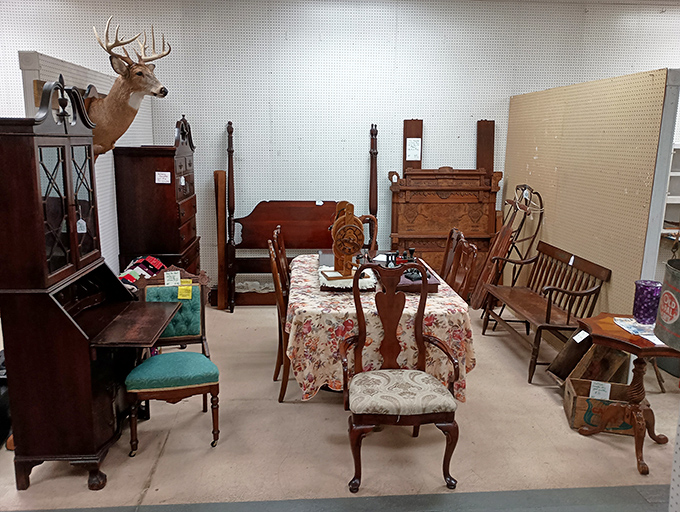 A dining room set complete with mounted deer observer. Nothing says "Pennsylvania antique shopping" quite like furniture watched over by taxidermy.