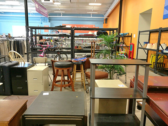 Office furniture mingles with barstools and shelving in the furniture department&mdash;a grown-up version of musical chairs where everything costs less than your monthly coffee budget.