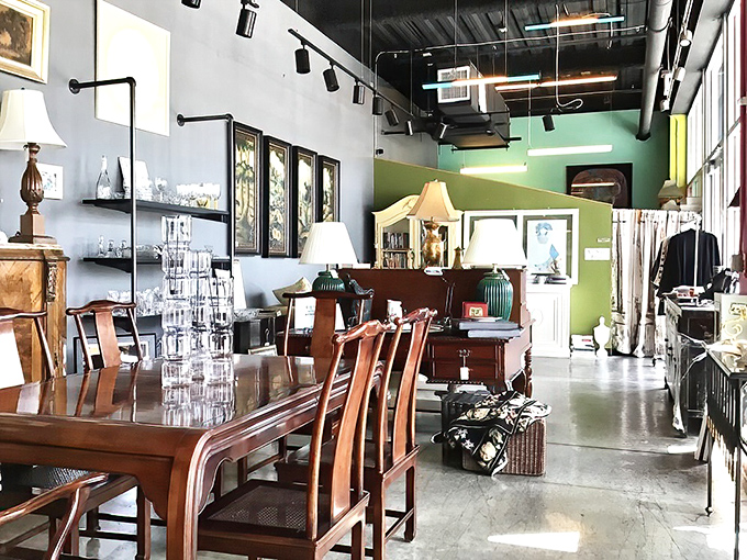 Dining furniture with the patina of experience. That wooden table has likely hosted more memorable meals than many restaurants.