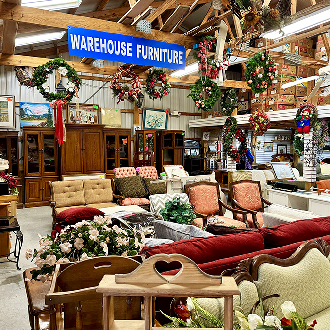 The furniture warehouse transforms during holiday seasons, with festive wreaths hovering above sofas and chairs like Christmas halos.