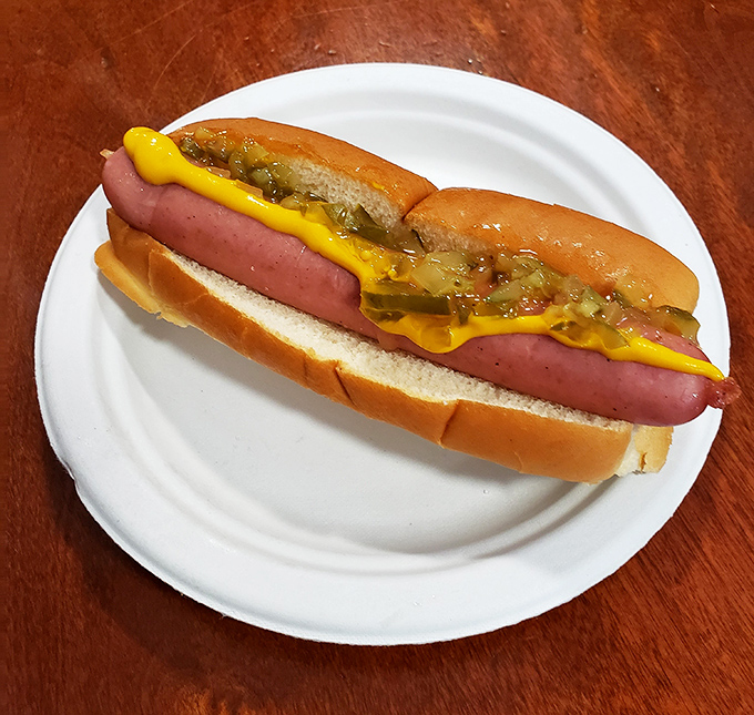 The classic Gilley dog with mustard and relish—proof that some traditions deserve to be preserved exactly as they've always been.