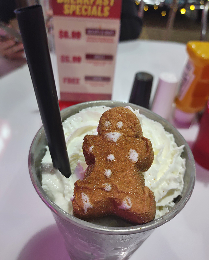 A milkshake topped with a gingerbread man&mdash;because sometimes dessert needs its own dessert. Childhood joy in a glass.