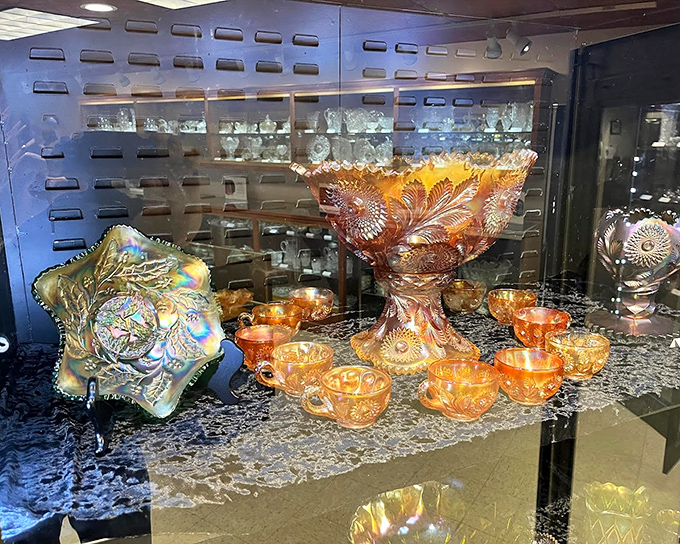 Carnival glass that would make your grandmother swoon and start mentally rearranging her china cabinet. These iridescent treasures capture light like Victorian Instagram filters.