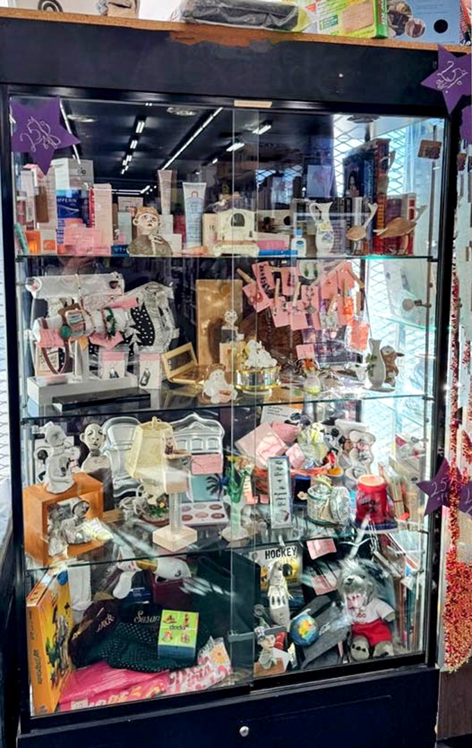 This glass cabinet is childhood nostalgia under lock and key. Dolls and figurines patiently waiting for collectors who recognize their worth.