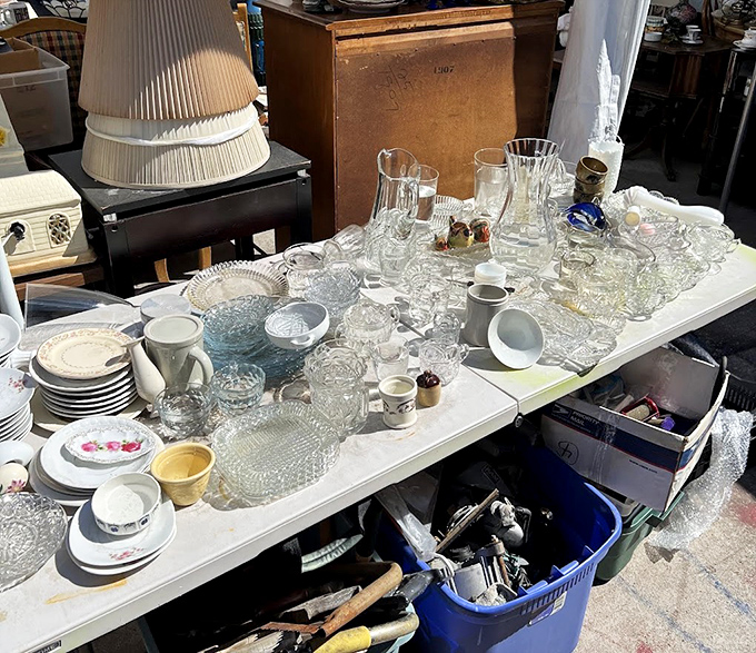 Crystal and glassware catching the sunlight, each piece whispering tales of dinner parties and celebrations from decades past.