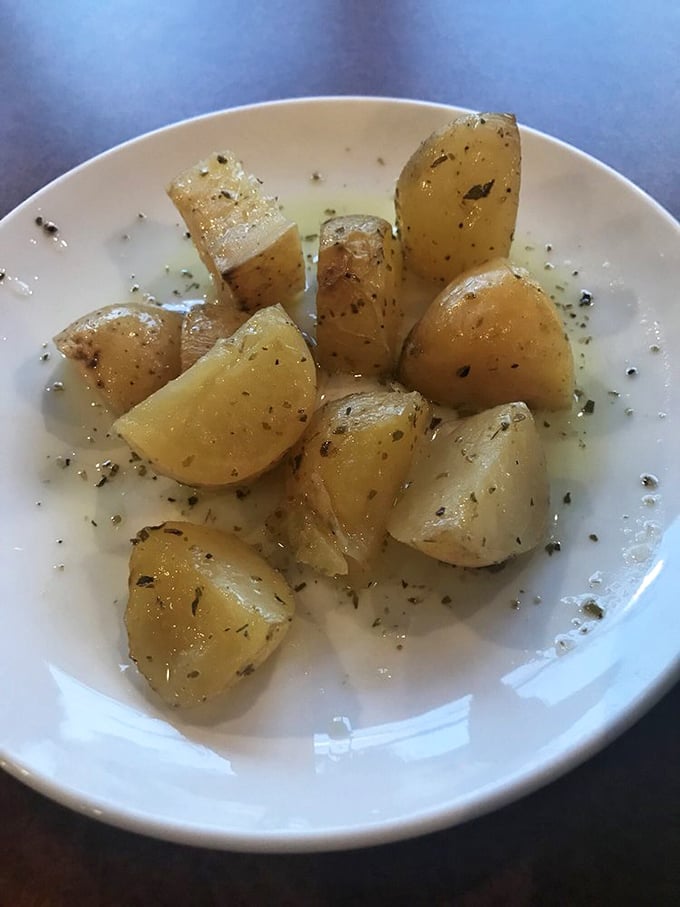 These humble potatoes have been transformed by olive oil and herbs into something your grandmother would approve of&mdash;regardless of her nationality.