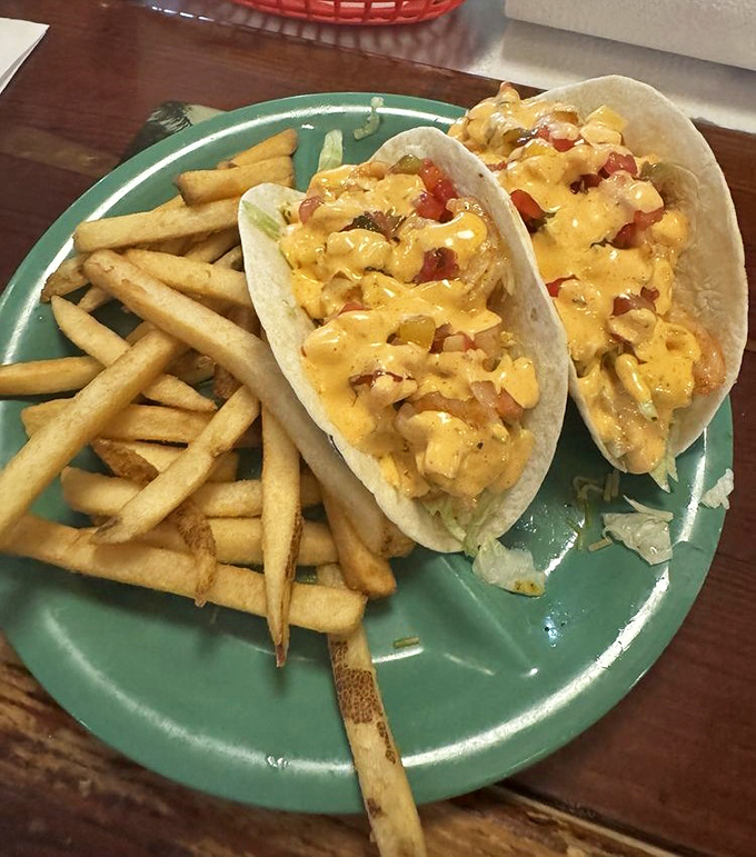 Grilled shrimp tacos bursting with color and flavor. Proof that sometimes the best things in life come wrapped in a tortilla.