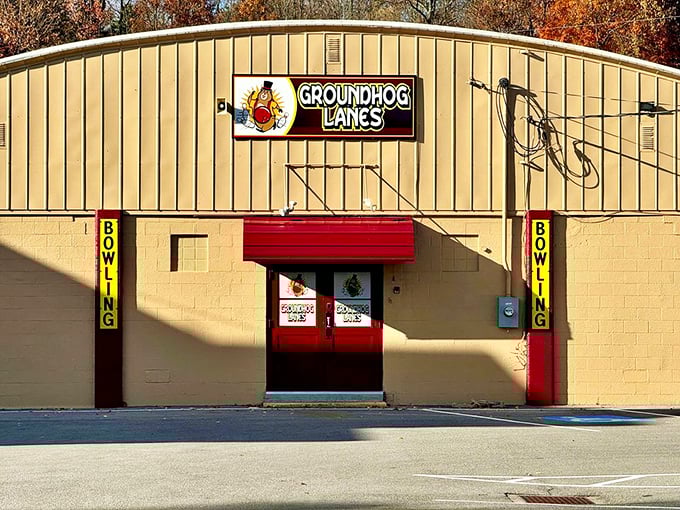 Groundhog Lanes proves bowling alleys follow the same design philosophy nationwide: practical exteriors hiding the symphony of pins and personalities inside.