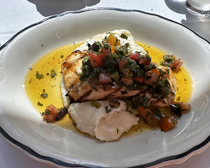 Halibut that's traveled less distance to your plate than you did to the restaurant, adorned simply with bright tomato salsa.