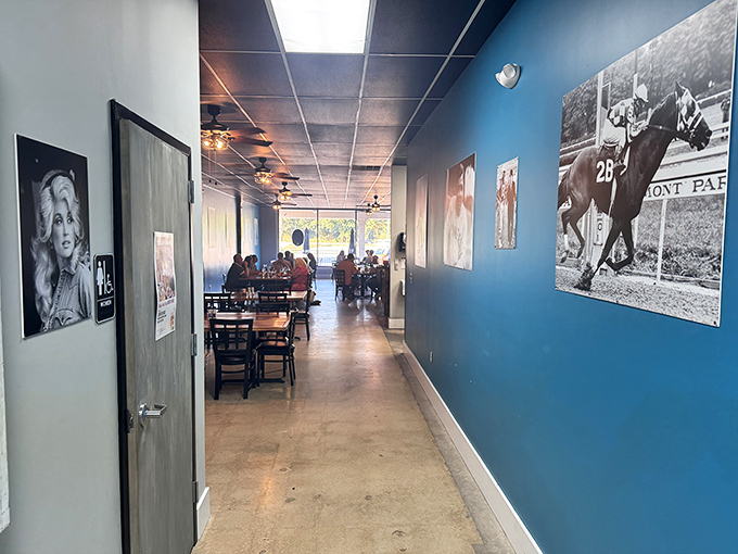 The hallway gallery walk gives you something to admire while you contemplate whether you have room for dessert (spoiler: you do).