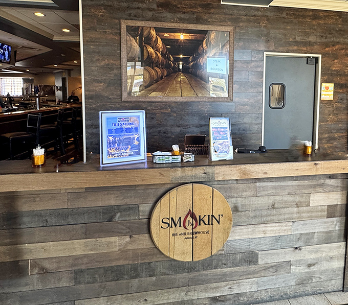 Rustic meets refined at the host station, where that barrel-inspired logo promises smoky treasures await. First impressions matter, and this one's saying "you've chosen wisely."
