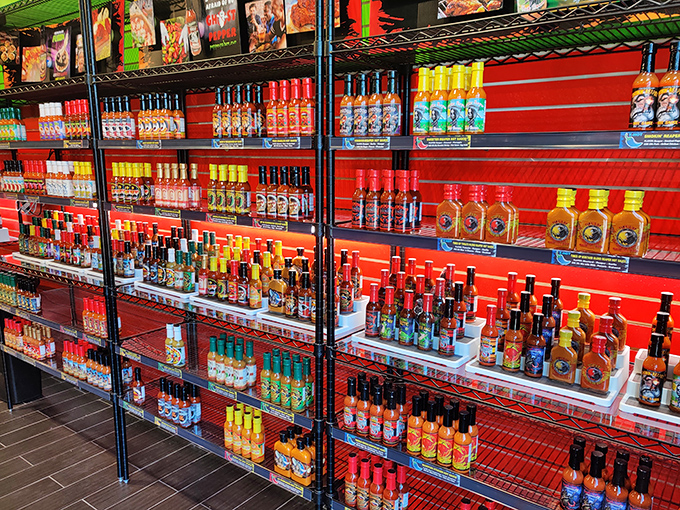 Hot sauce bottles lined up like spicy soldiers, ready to add fire to everything from eggs to regrets.
