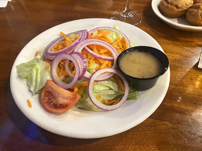 A house salad that actually looks like something you'd want to eat&mdash;crisp, colorful, and thoughtfully composed rather than an afterthought.