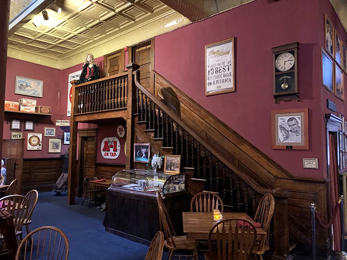 The wooden staircase and burgundy walls showcase memorabilia from Arizona's territorial days, when Prescott served as the capital and The Palace served the lawmakers.