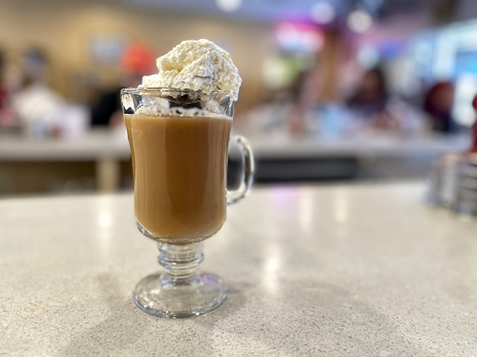 The Irish coffee comes dressed for success, topped with a cloud of whipped cream that's begging to leave a mustache.