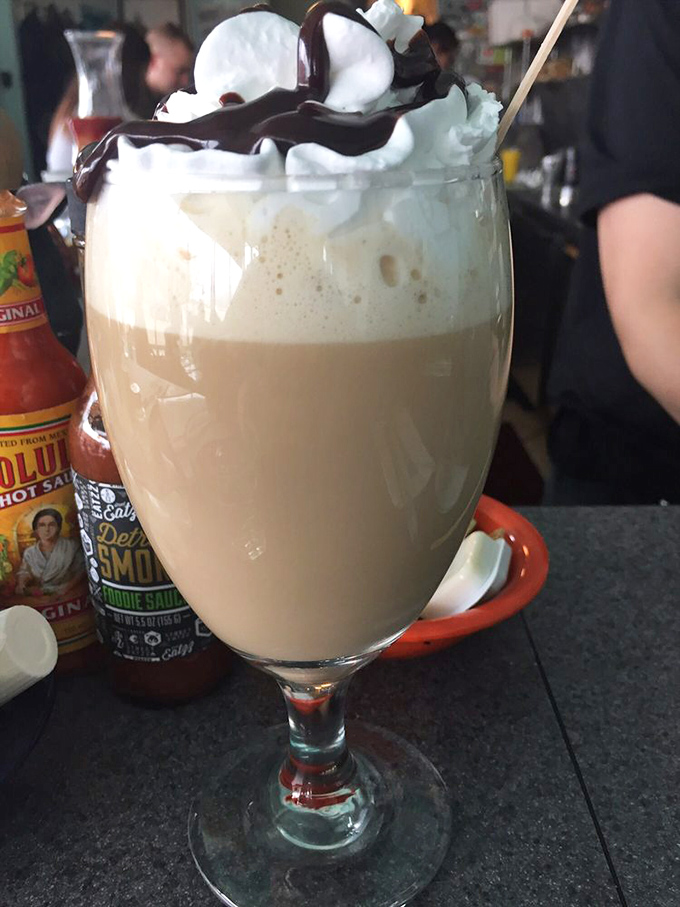 This isn't just a coffee drink&mdash;it's dessert with an employment history, topped with enough whipped cream to make your dentist buy a vacation home.