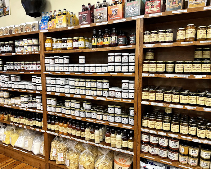 The jam wall&mdash;where fruit achieves immortality. These jars hold summer sunshine, ready to brighten even the grayest Ohio morning.