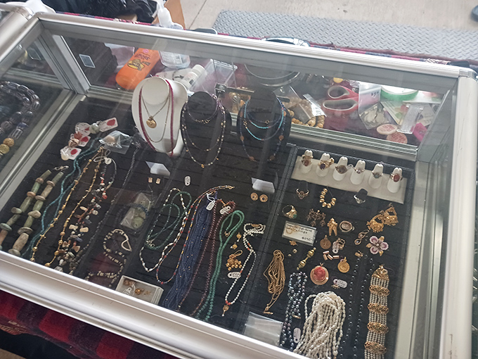 A glass case of possibilities – vintage jewelry that once adorned someone's special occasions now waits for new memories to be made.