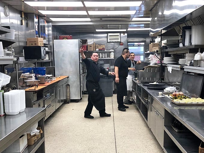 The kitchen ballet—where orders fly, pans sizzle, and the choreography of breakfast service unfolds with practiced precision and occasional jazz hands.