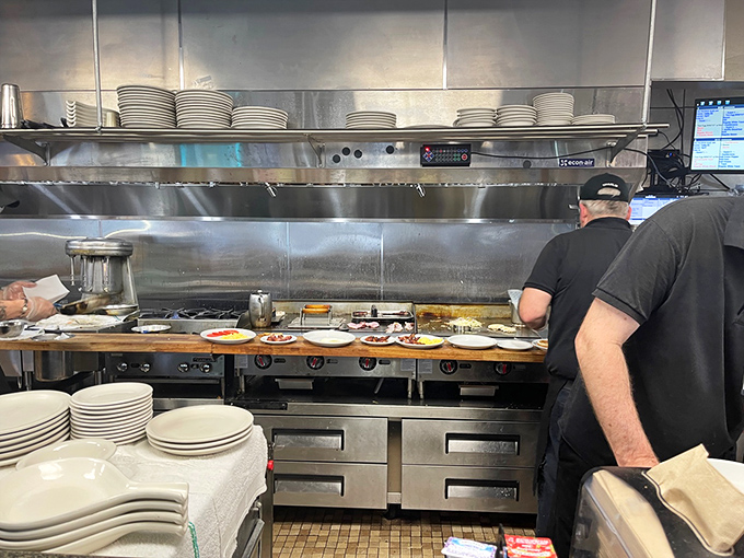 The kitchen ballet in full swing&mdash;where short-order choreography turns simple ingredients into the breakfast masterpieces that keep locals coming back.