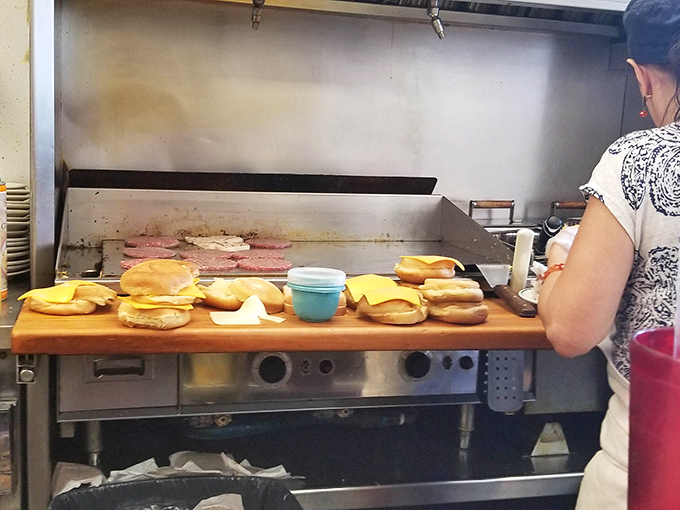 The breakfast assembly line where magic happens. Those buns aren't just toasting—they're preparing for greatness.