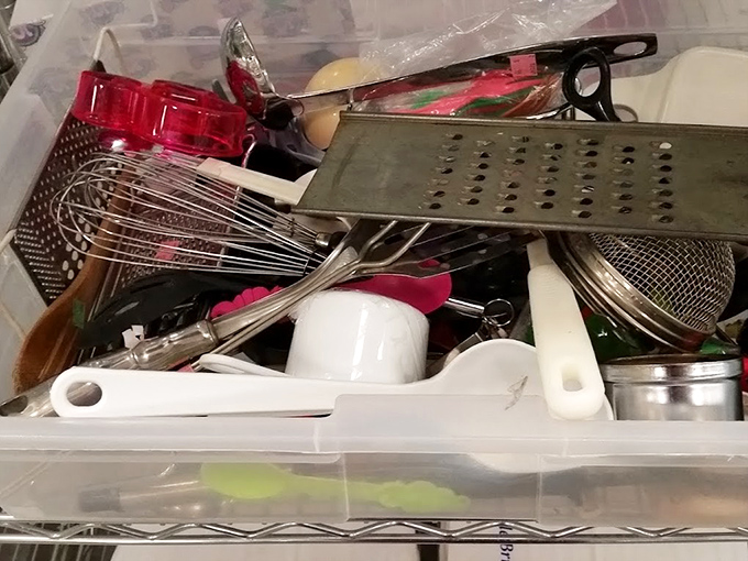 Kitchen drawer chaos, neatly organized &ndash; whisks, graters and gadgets whose purposes remain mysterious even to experienced cooks.