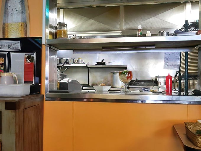 That kitchen pass-through where all the magic happens before landing on your table&mdash;the backstage of deliciousness, basically speaking.