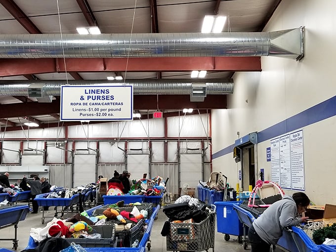 The sign for linens and purses promises soft landings and stylish carrying solutions for your newfound treasures.