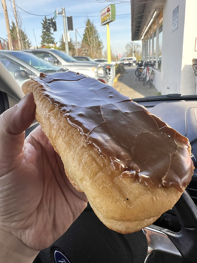 This chocolate-topped masterpiece isn't just a donut; it's a commitment. Relationships have started over less impressive displays of perfection.